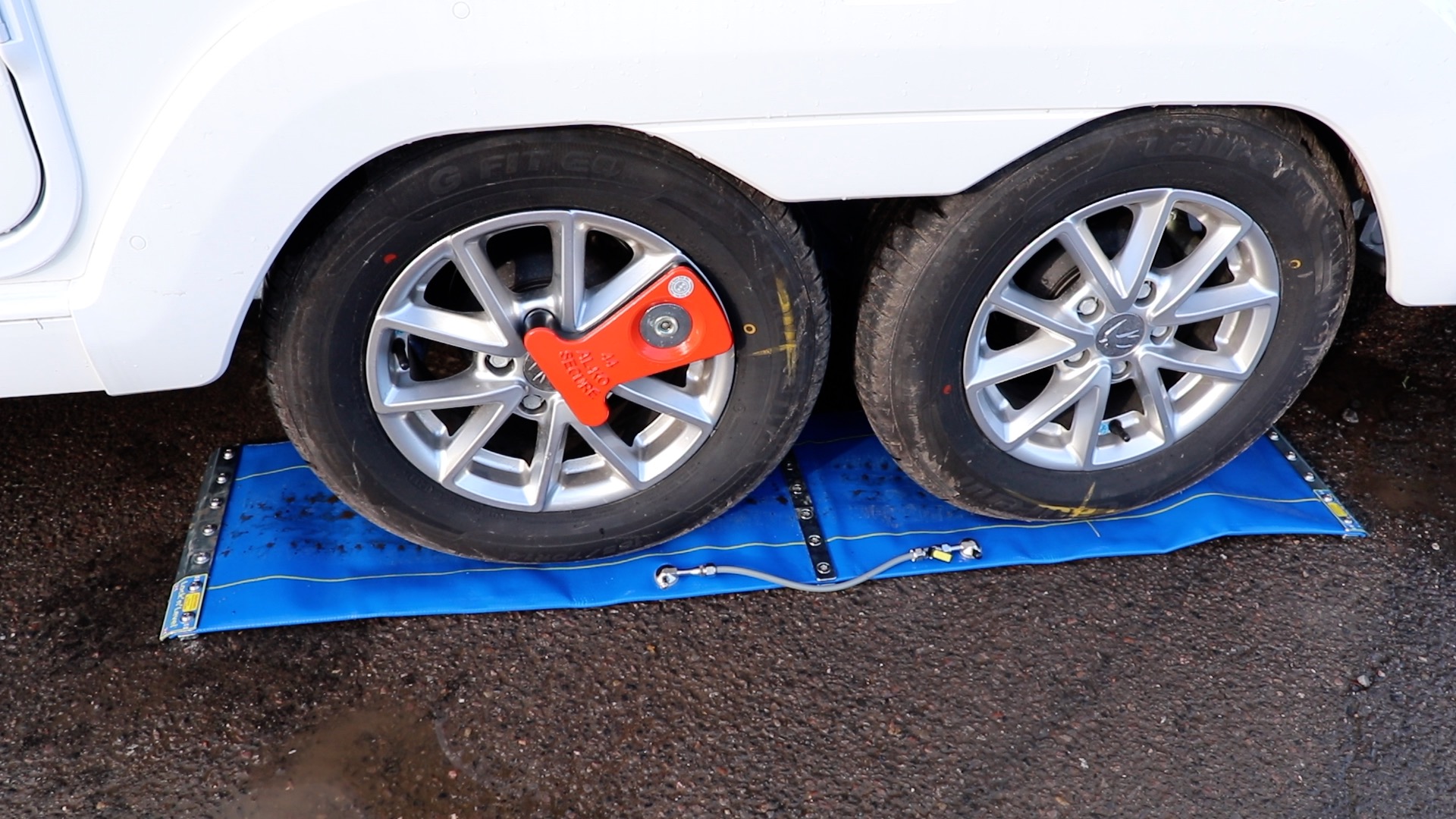 Video: Fitting axle wheel locks to a twin axle caravan